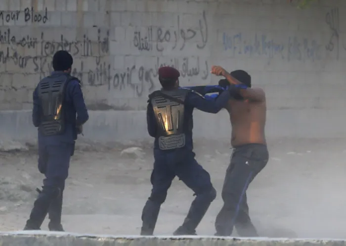 Bahrain protesters face birdshot, tear gas
