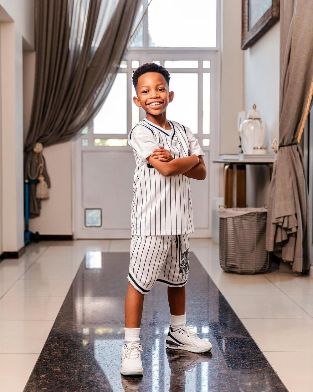 Nandi Madida's son Shaka makes waves at his first solo art exhibition ...