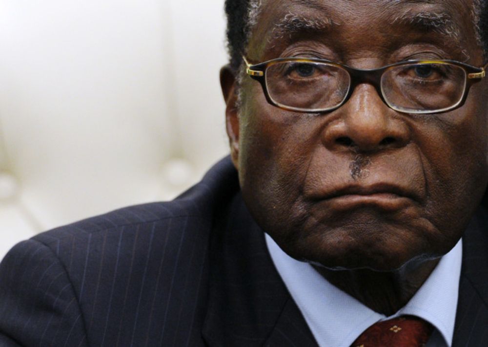 Mugabe vows to seize foreign firms - again