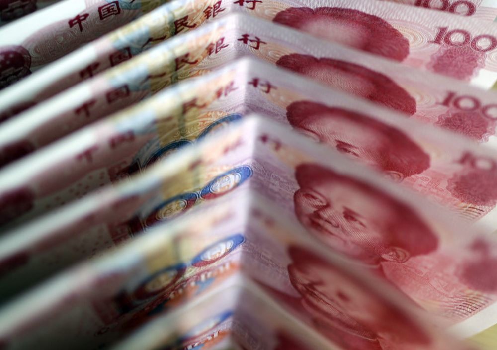 China’s central bank devalues yuan