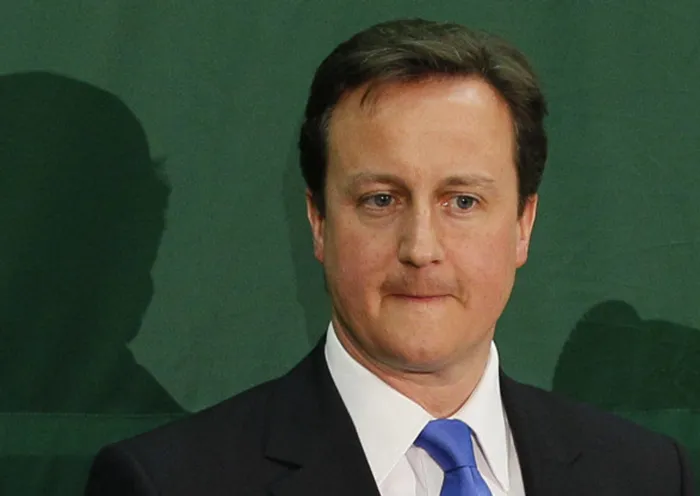 Cameron defends budget cuts