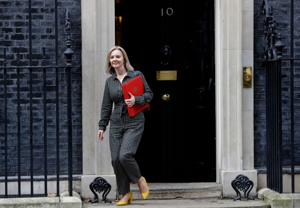 UK PM fights for survival in first parliament questions since U-turns