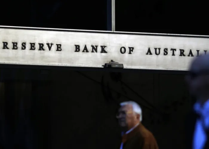 Australia cuts key rate to new low