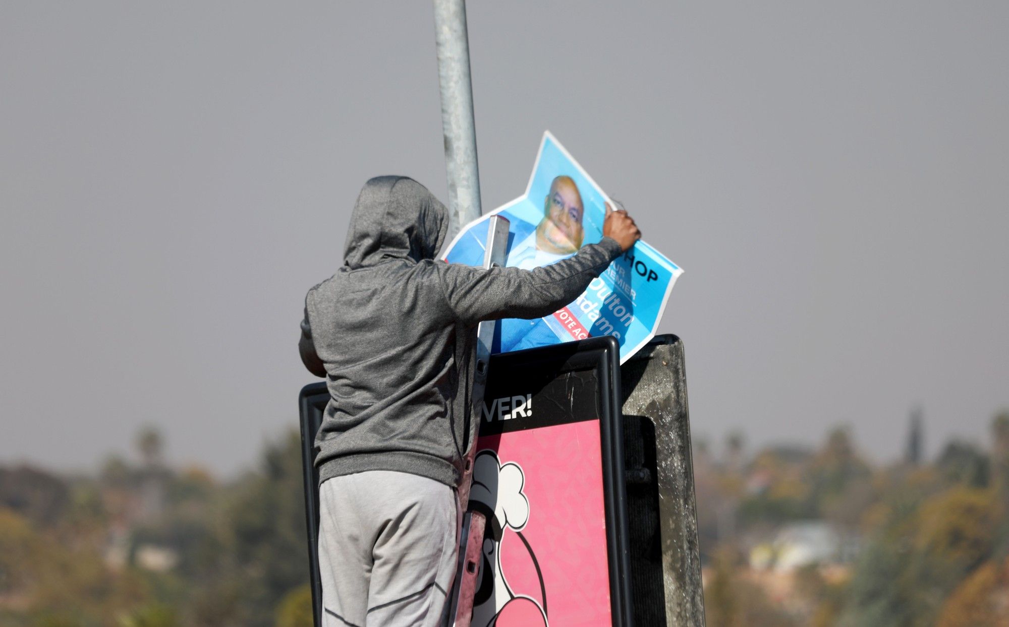 Political parties warned of fines over elections poster removal