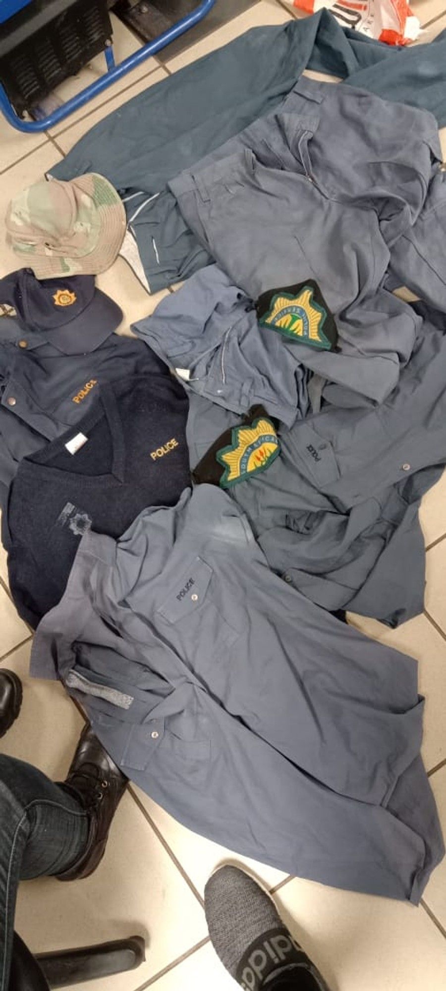 Police foil robbery and arrest two men with police uniform, firearm and ...