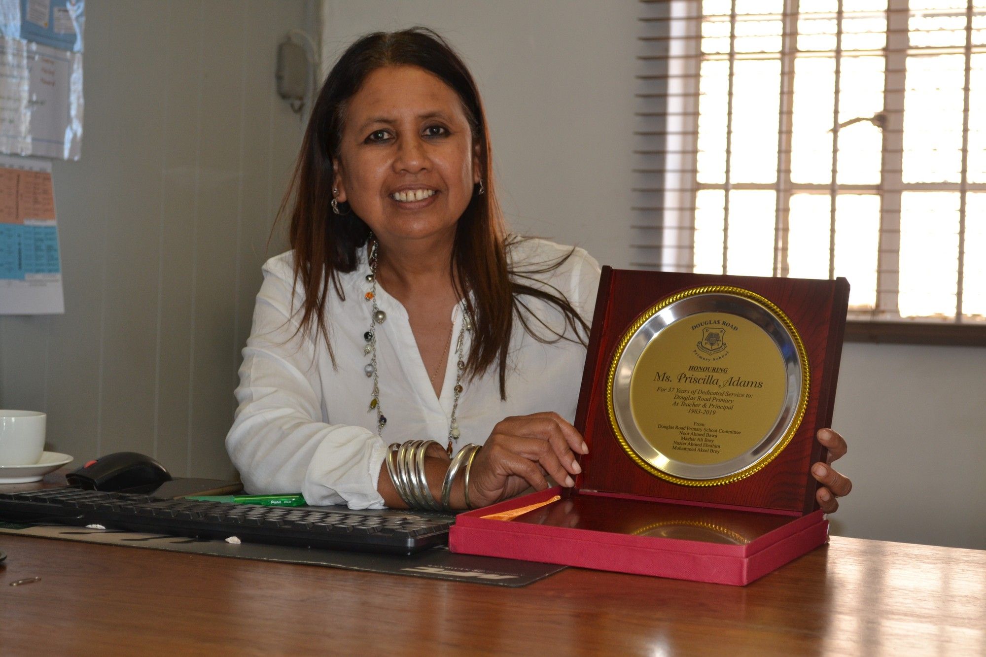 Principal retires after ’extra year’ of reflection