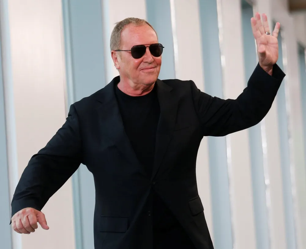 Michael Kors buys high-fashion label Versace