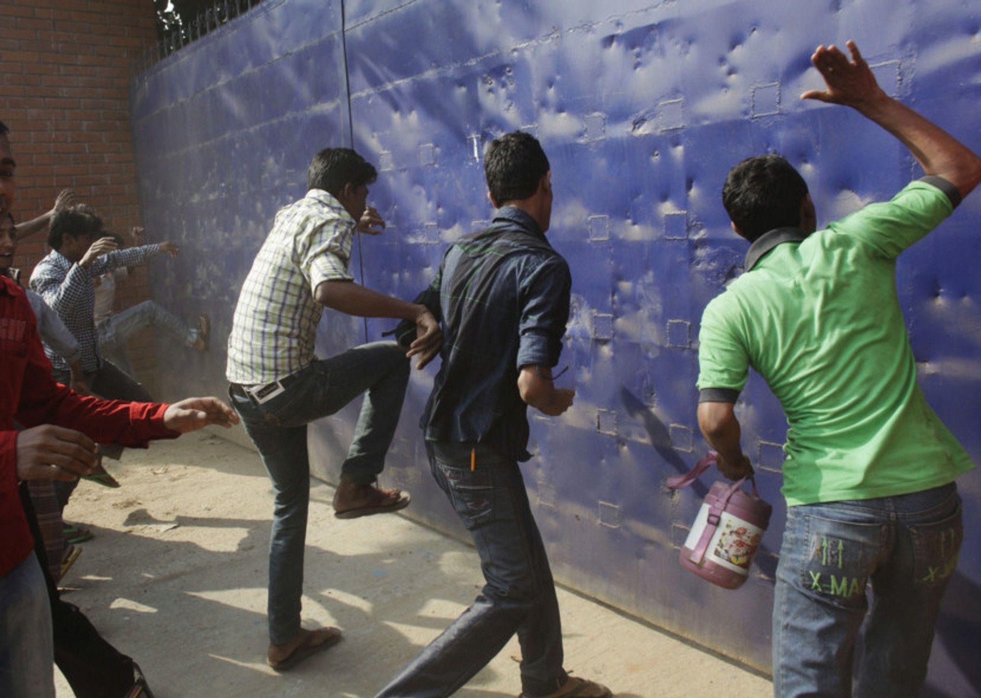 Protesters demand justice for factory fire victims