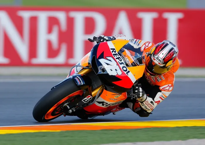 Honda wins crash-strewn MotoGP finale