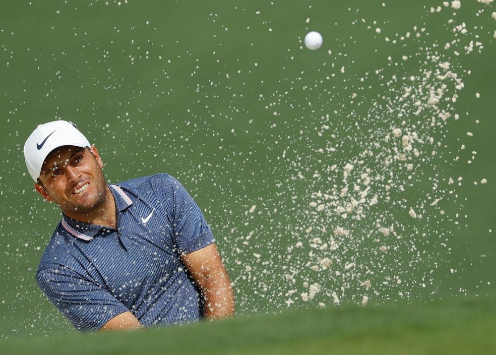 Molinari grabs clubhouse lead in second round of the Masters