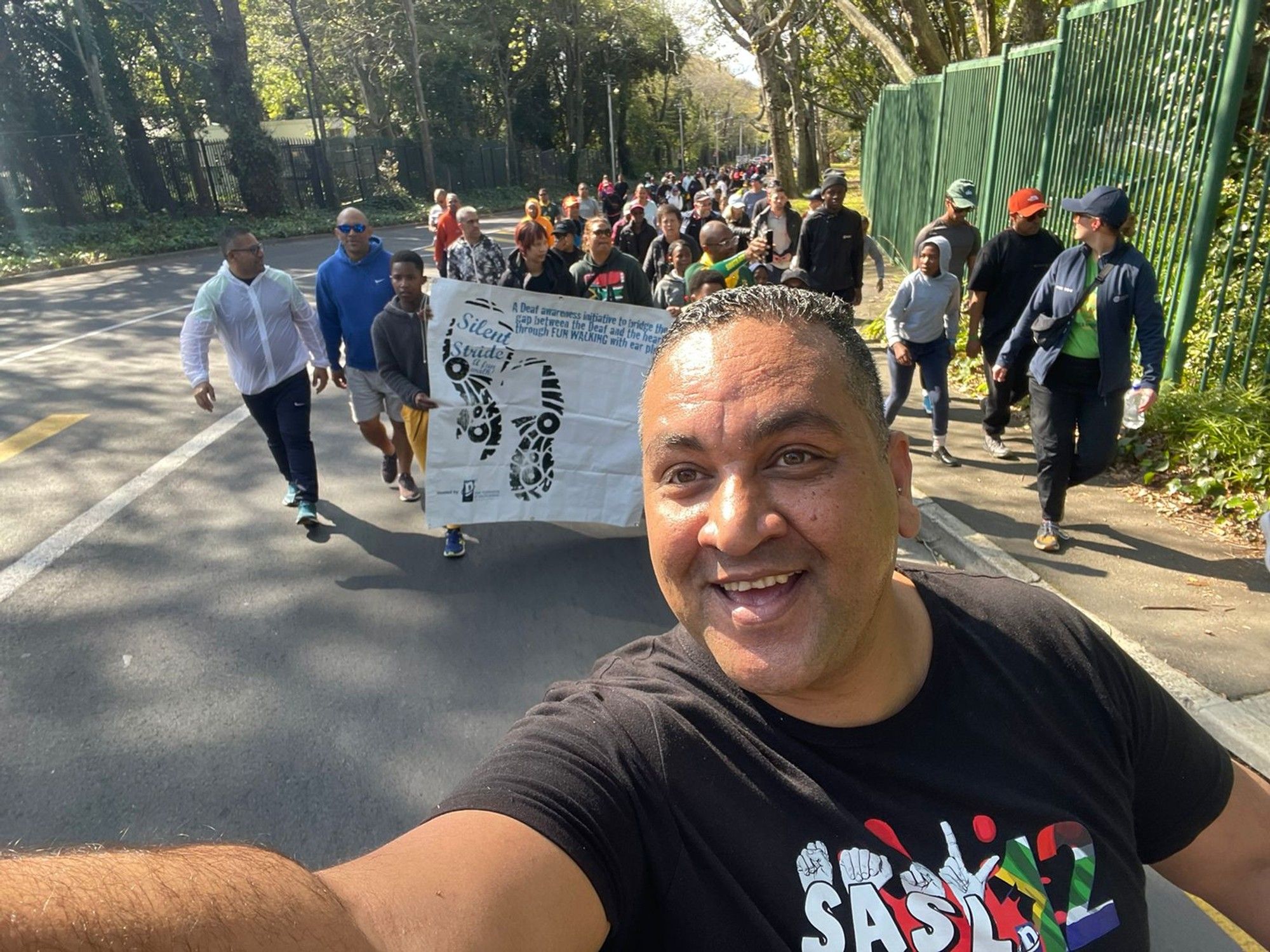 Silent Walk brings hundreds to streets for deaf awareness