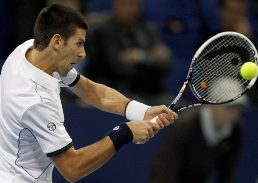 Djokovic powers up in Basel