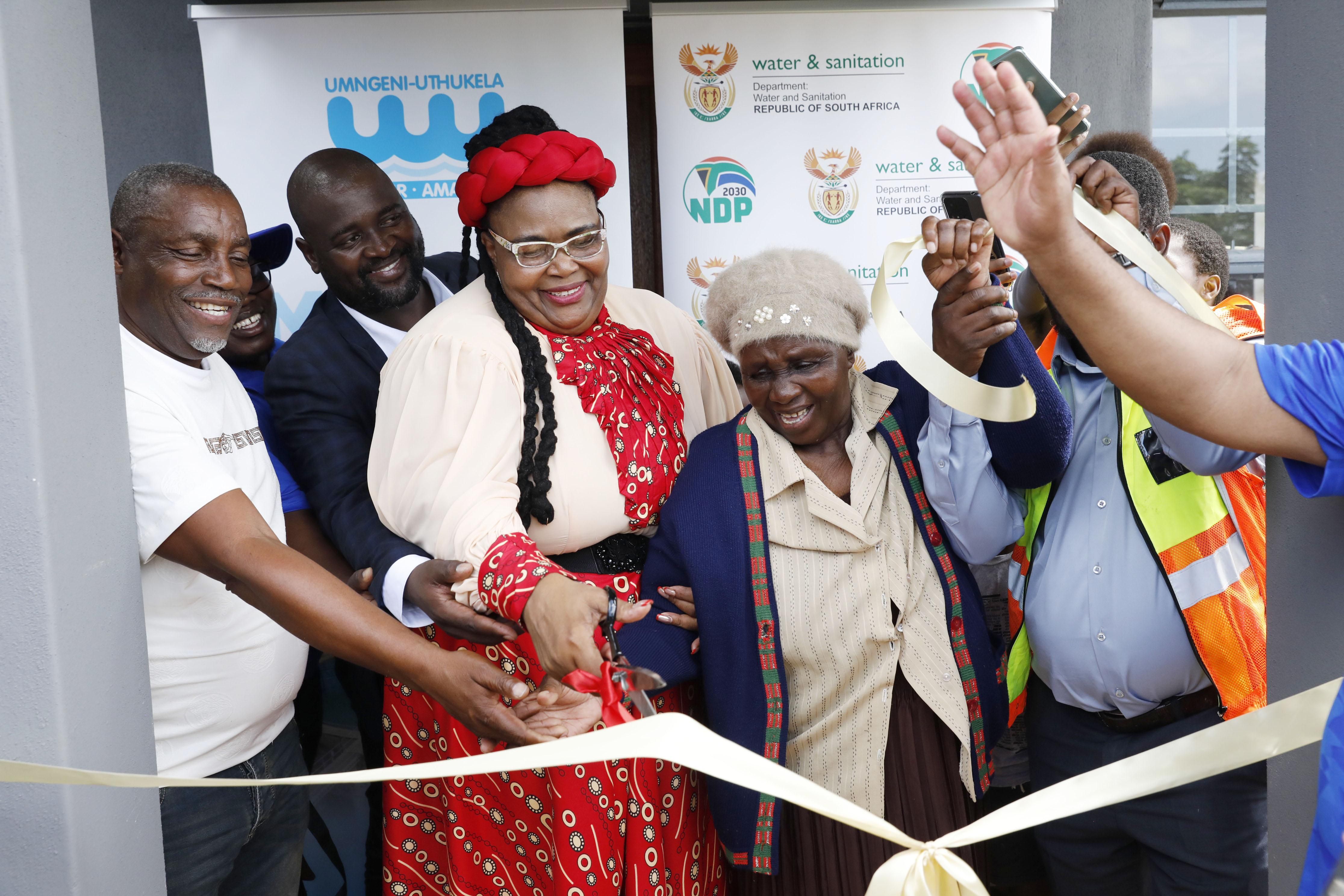 Families finally receive homes after seven years of waiting due to ...