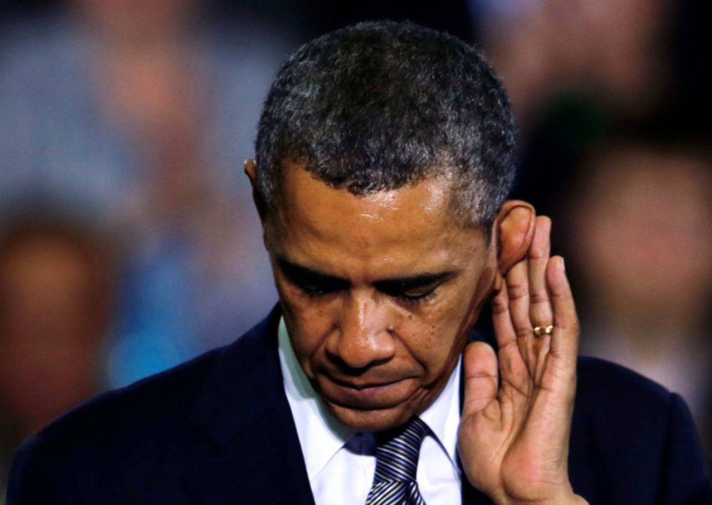 Emotional Obama makes gun plea