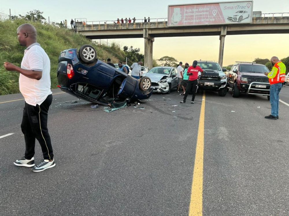 Three people injured as vehicle flips over in head-on collision