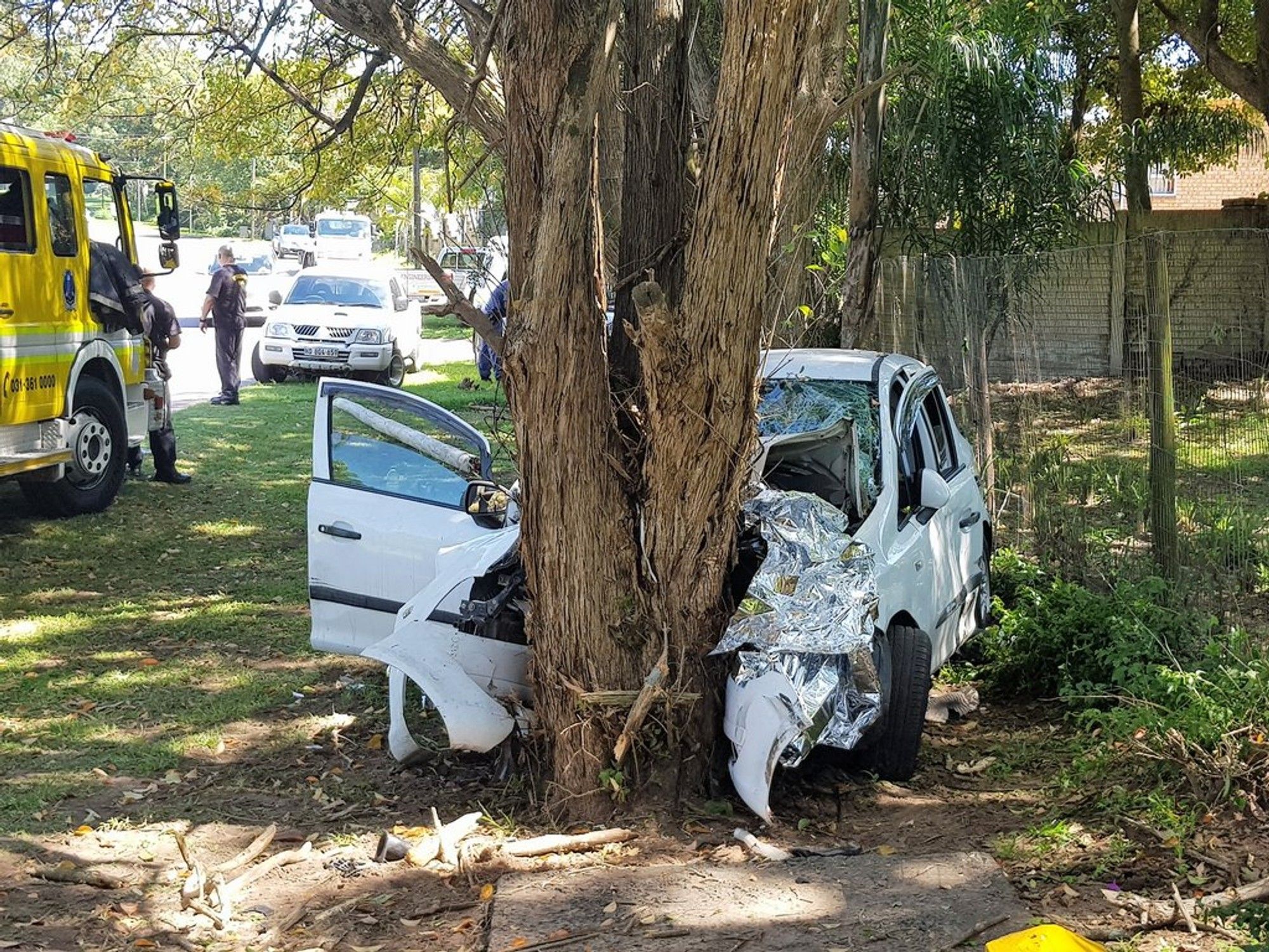One killed, four injured as car hits tree after collision