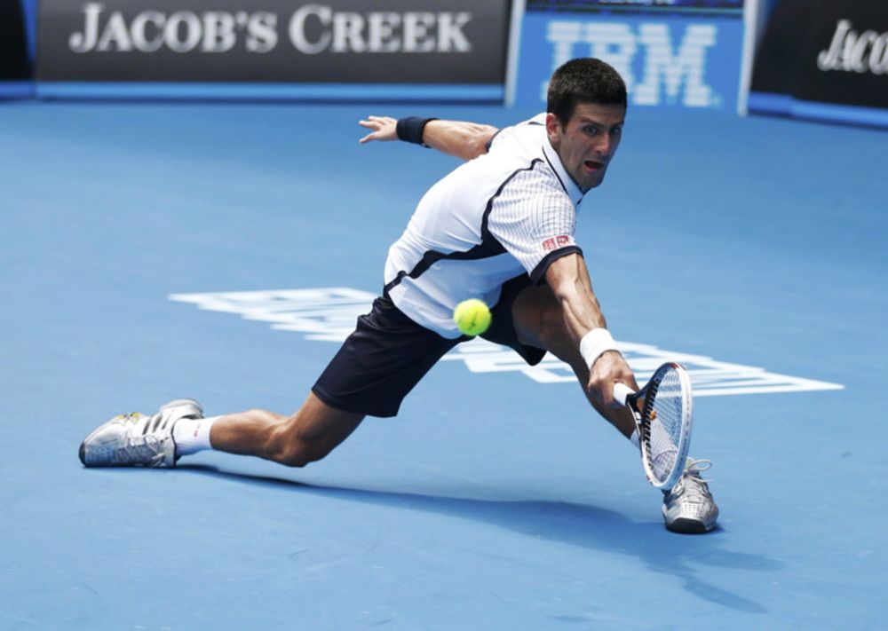 Djokovic labours into fourth round