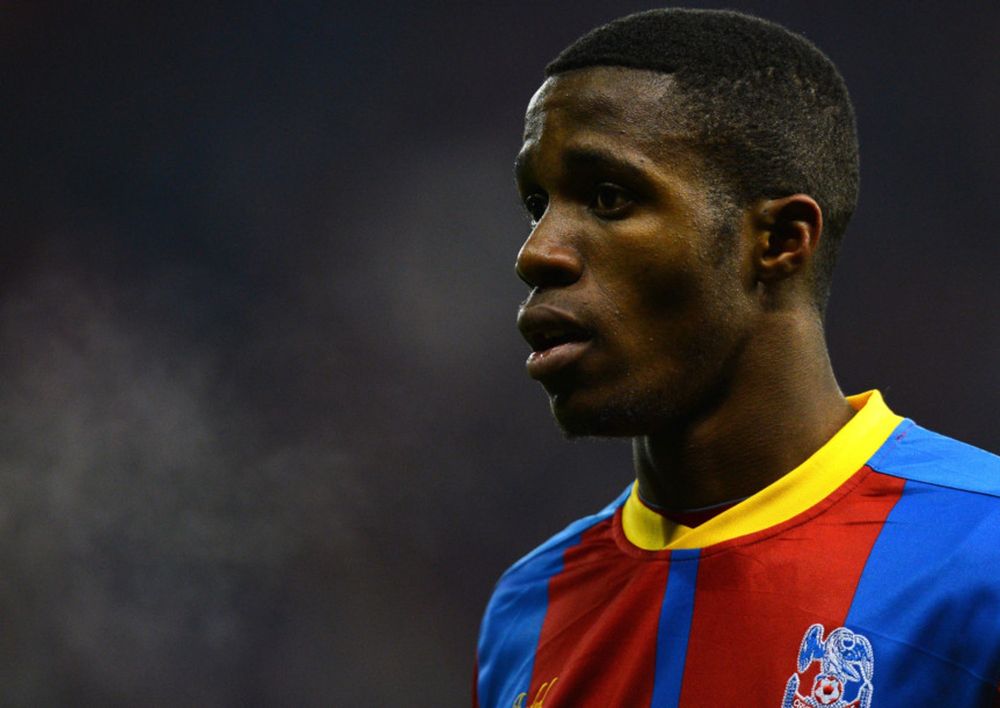 Zaha charged for rude gesture