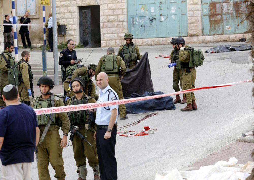 Soldier shoots Palestinian knifeman in cold blood