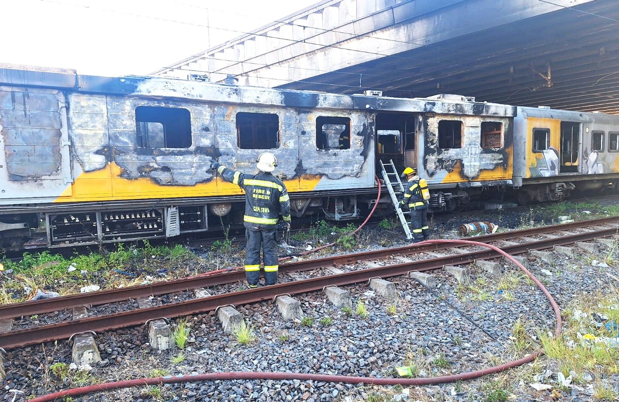 Derelict train carriage burns in Woodstock