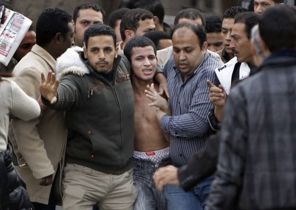 Machetes, gunshots transform leafy Cairo suburb